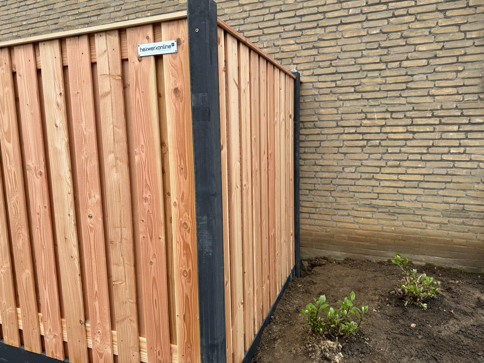 Warme douglas hout beton schutting